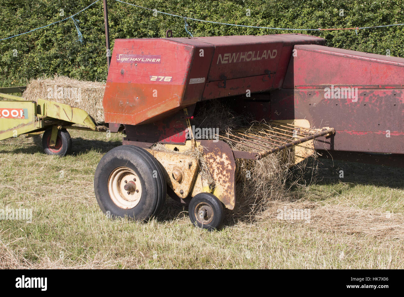 Haymaking, third stage, conventional baler Stock Photo - Alamy