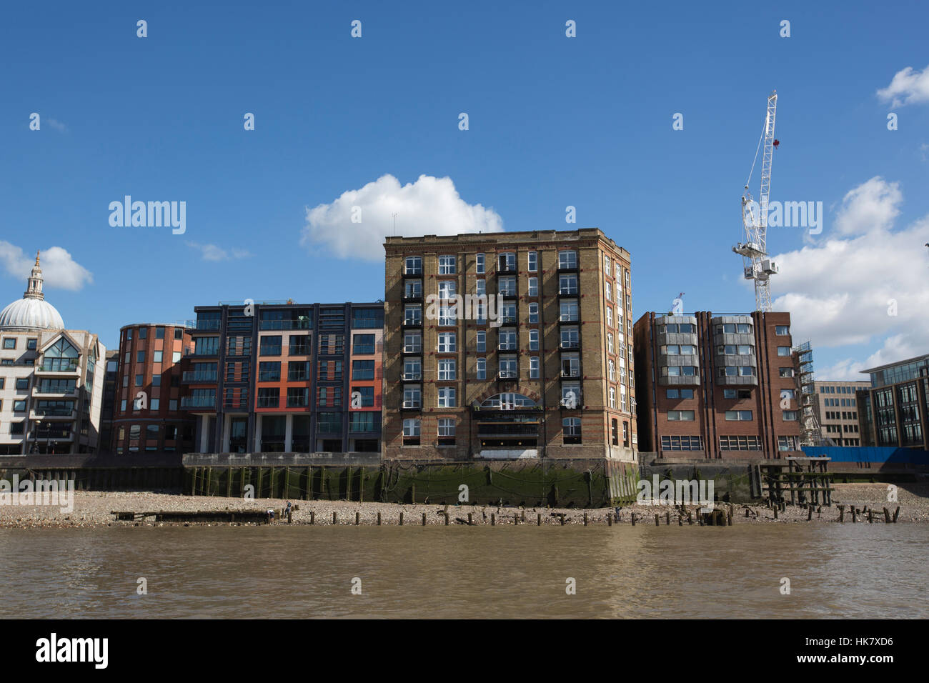 historic victorian warehouse on the north bank of the Thames opposite ...