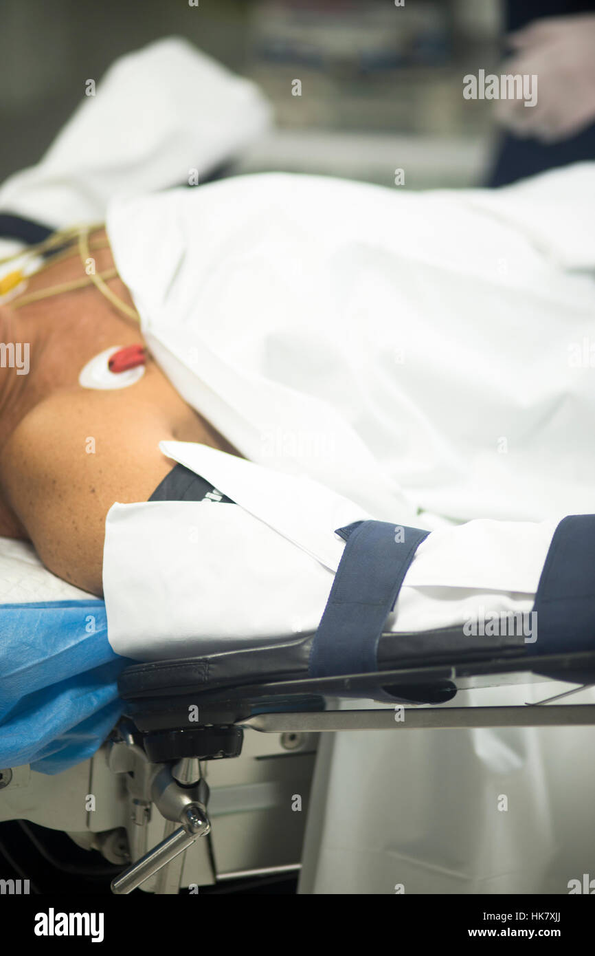 Hospital ward emergency room operating theater, patient bed and modern ...