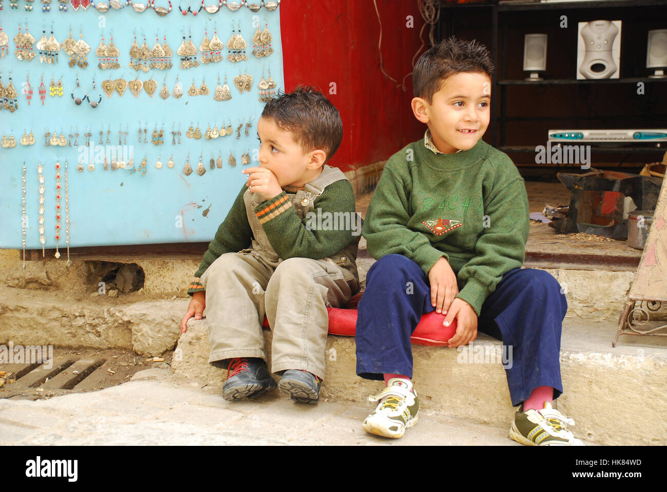 Two little boys in front of jewellery shop Medina of Fez Morocco Stock ...