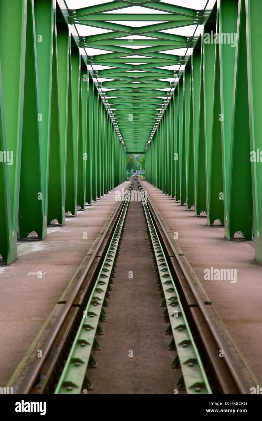 Railway bridge with steel grid structure Stock Photo - Alamy