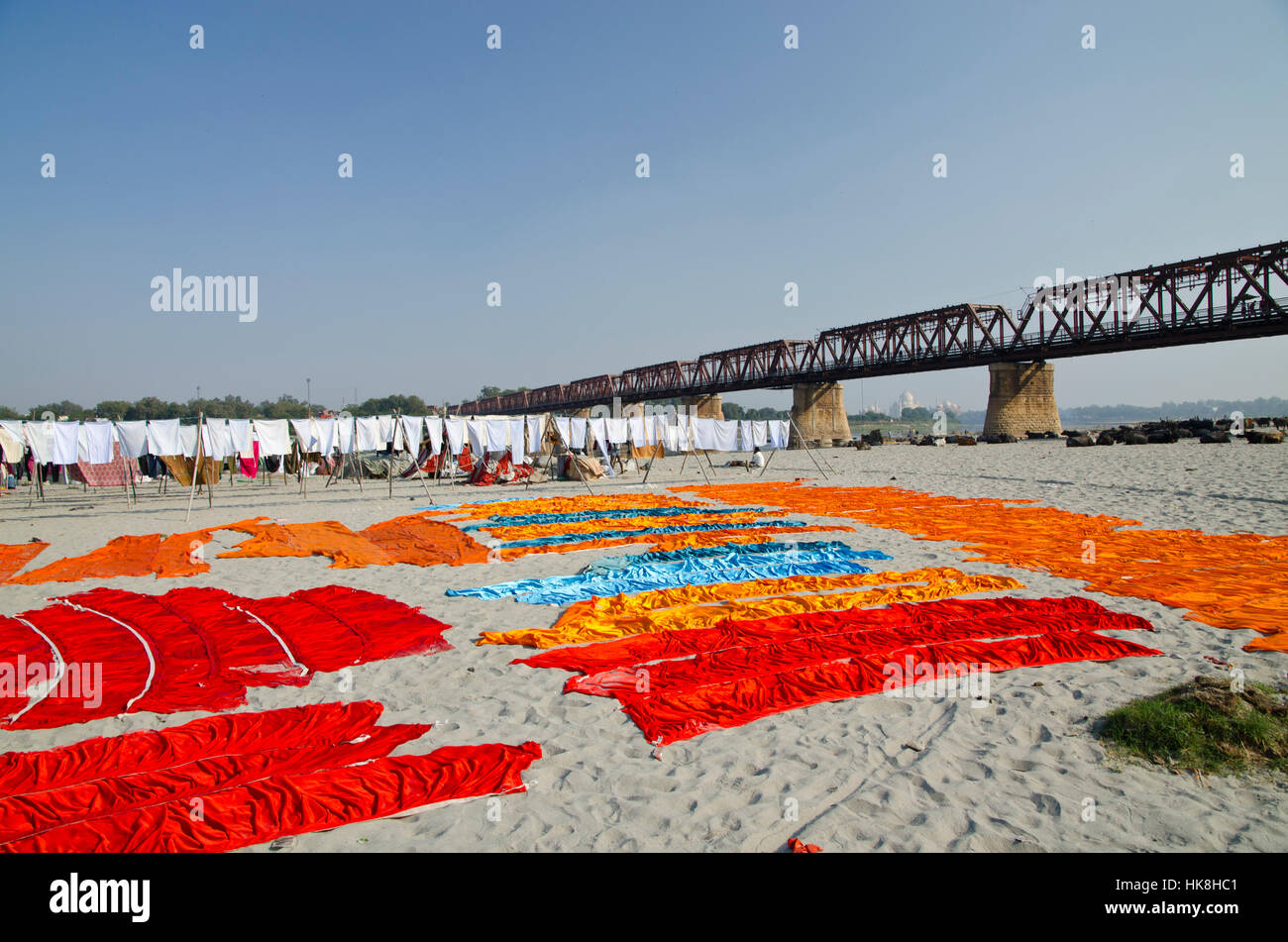 The Dhobis, the loundry workers, doing theyre work on the banks of ...