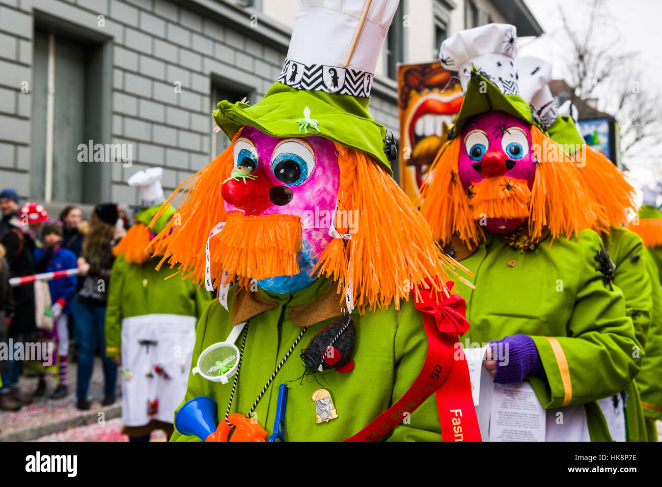 Masked men and women are joining the great procession of Basler ...