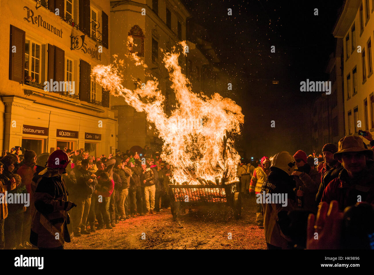 The Chienbäse is part of the Basler Fasnacht, carriers loaded with ...
