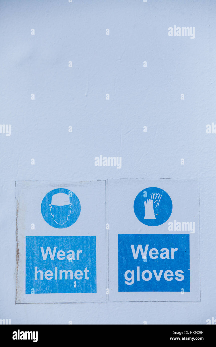 Close up shot of some signs with mandatory helmet and gloves Stock ...