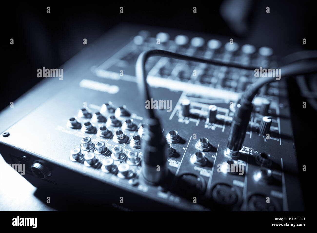 Close up shot of a mixer desk with many buttons and cables Stock Photo ...