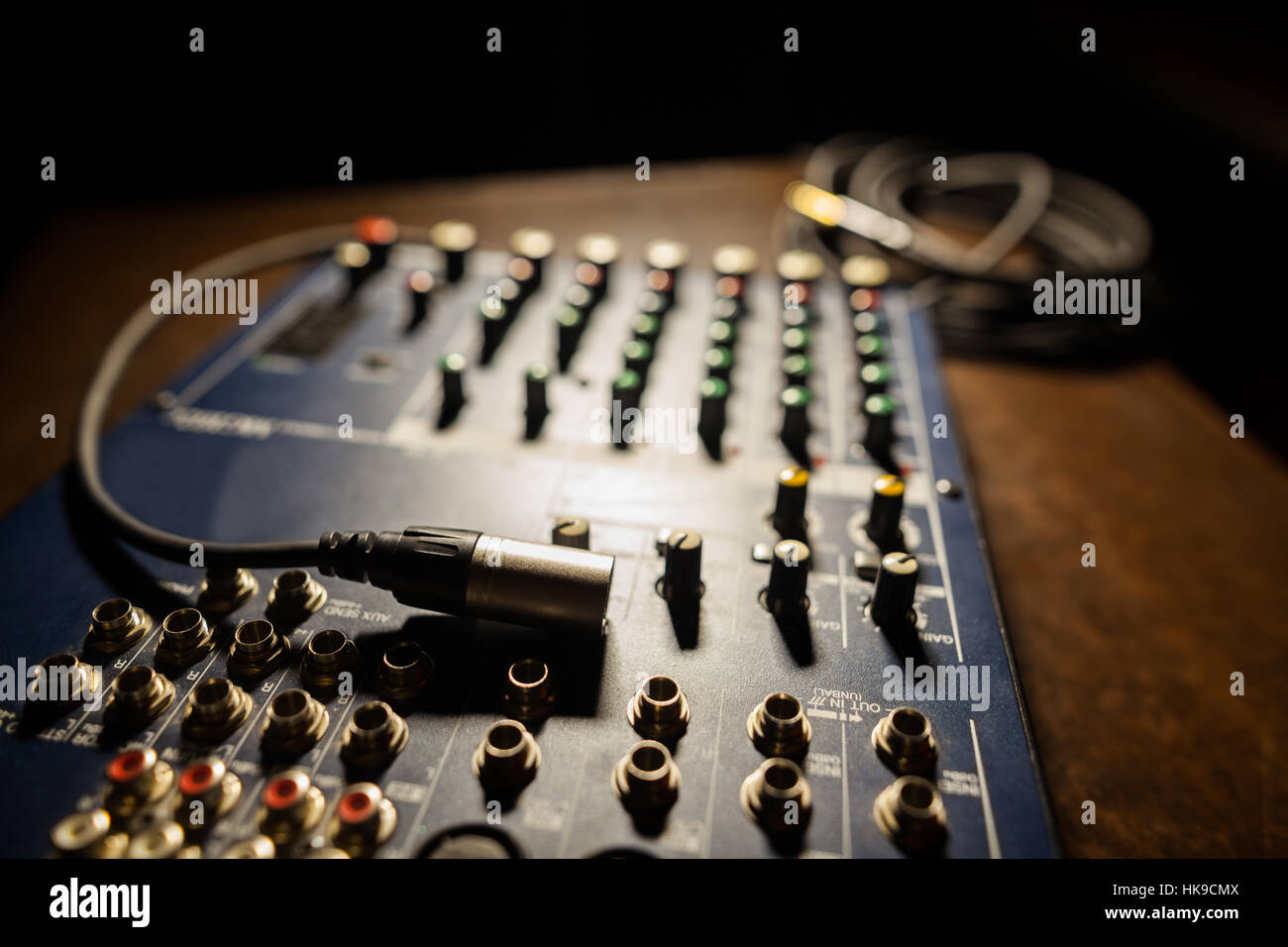 Close up shot of a mixer desk with many buttons and cables Stock Photo ...