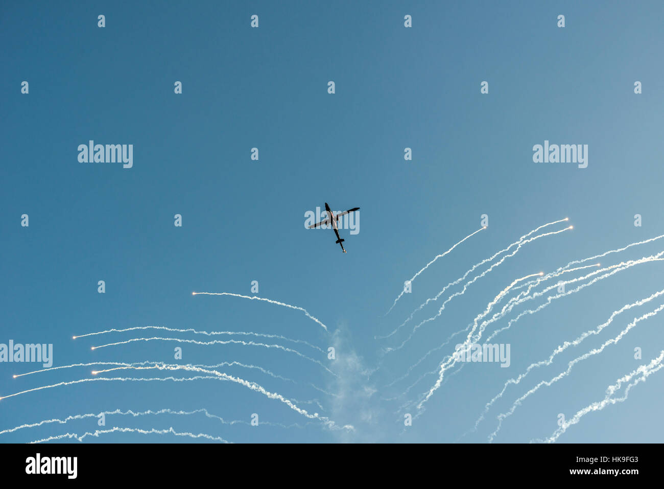 A helicopter is performing fireworks in the air Stock Photo - Alamy