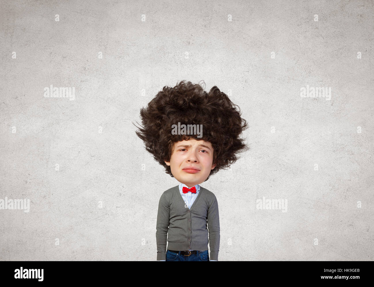 Funny crying young man with big head hi-res stock photography and ...