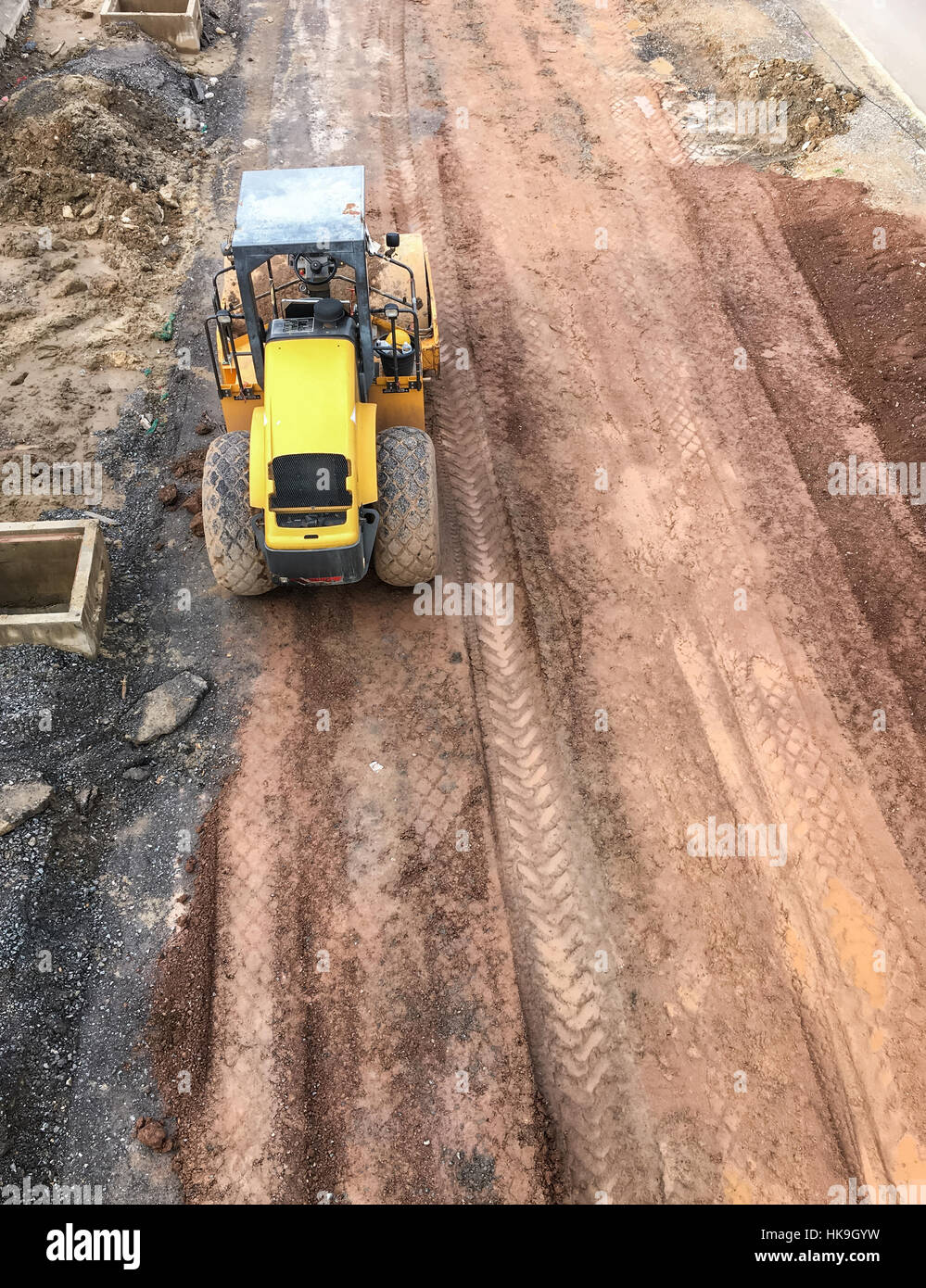 Large steamroller vehicle in the construction site of the urban area in ...