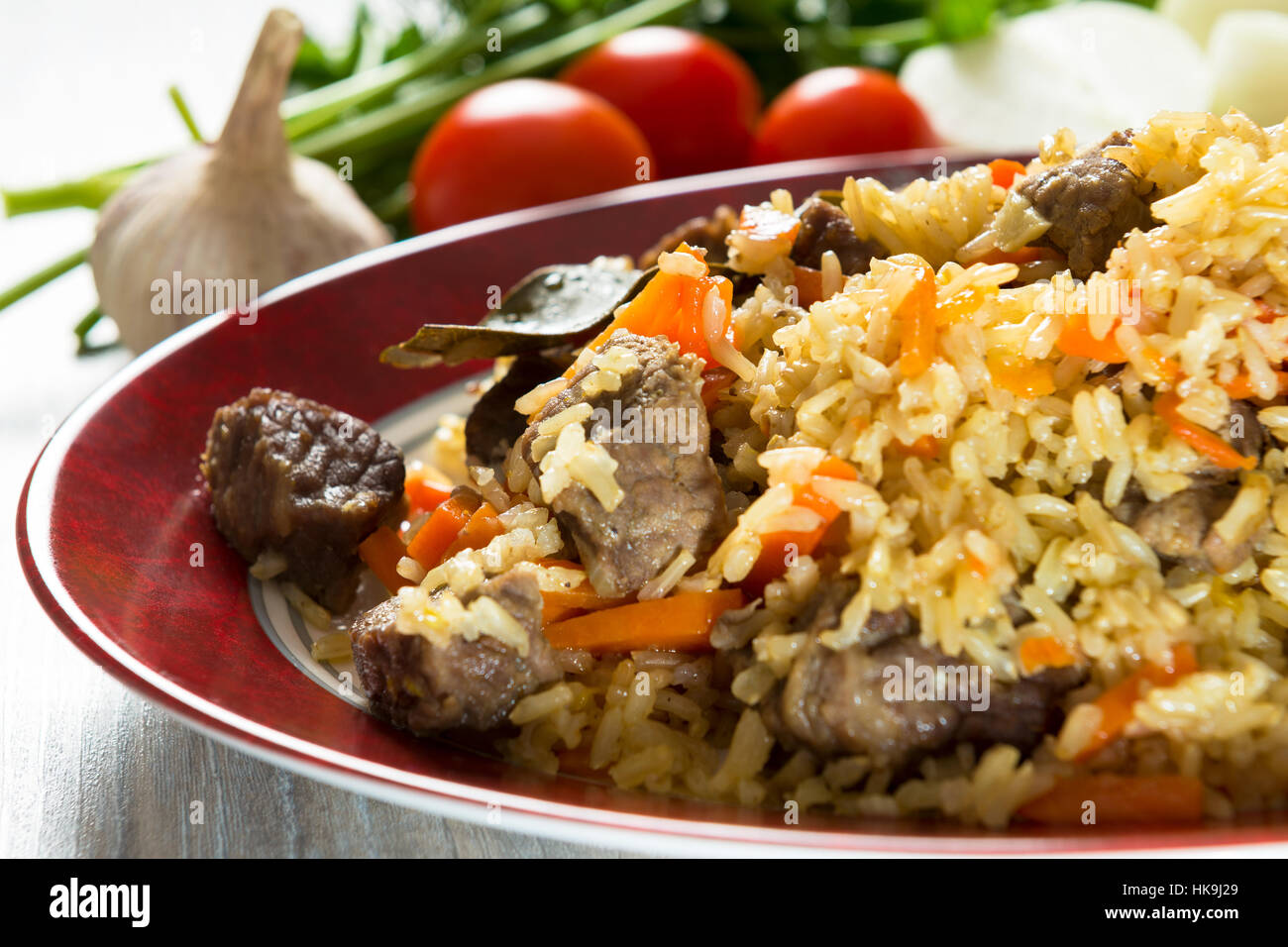Pilaf on the dining table Stock Photo - Alamy