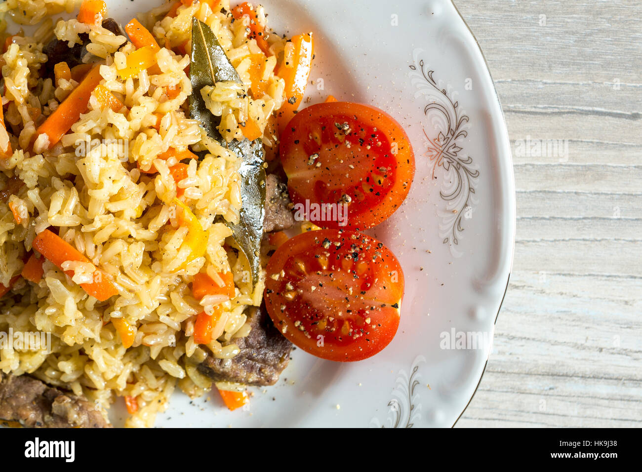 Pilaf on the dining table Stock Photo - Alamy