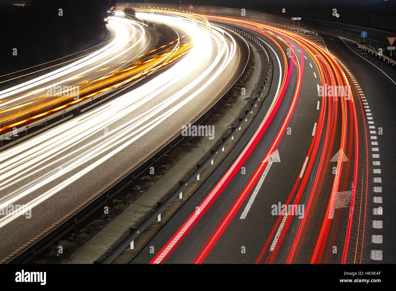 Long exposure shot of highway at night, with red and white blurred ...