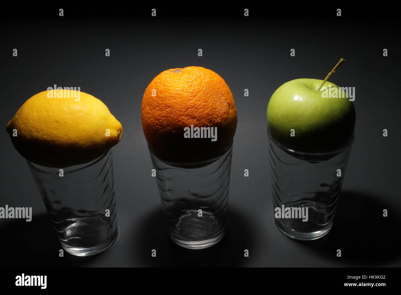 A Still Life of Assorted Fruit Contrasting the Background Stock Photo ...