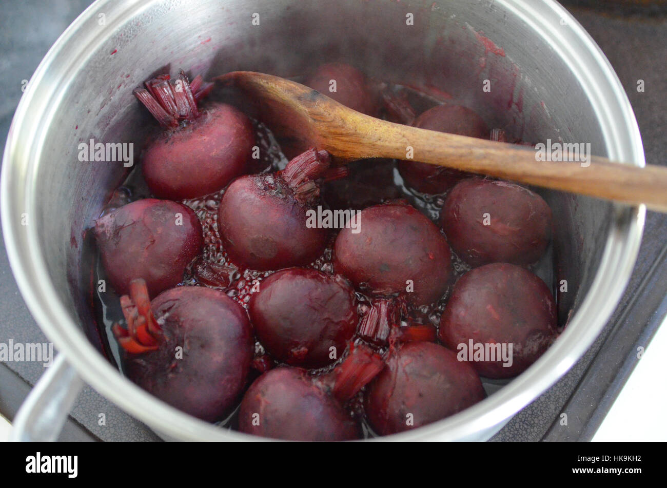 Water boiling in red pot hi-res stock photography and images - Alamy