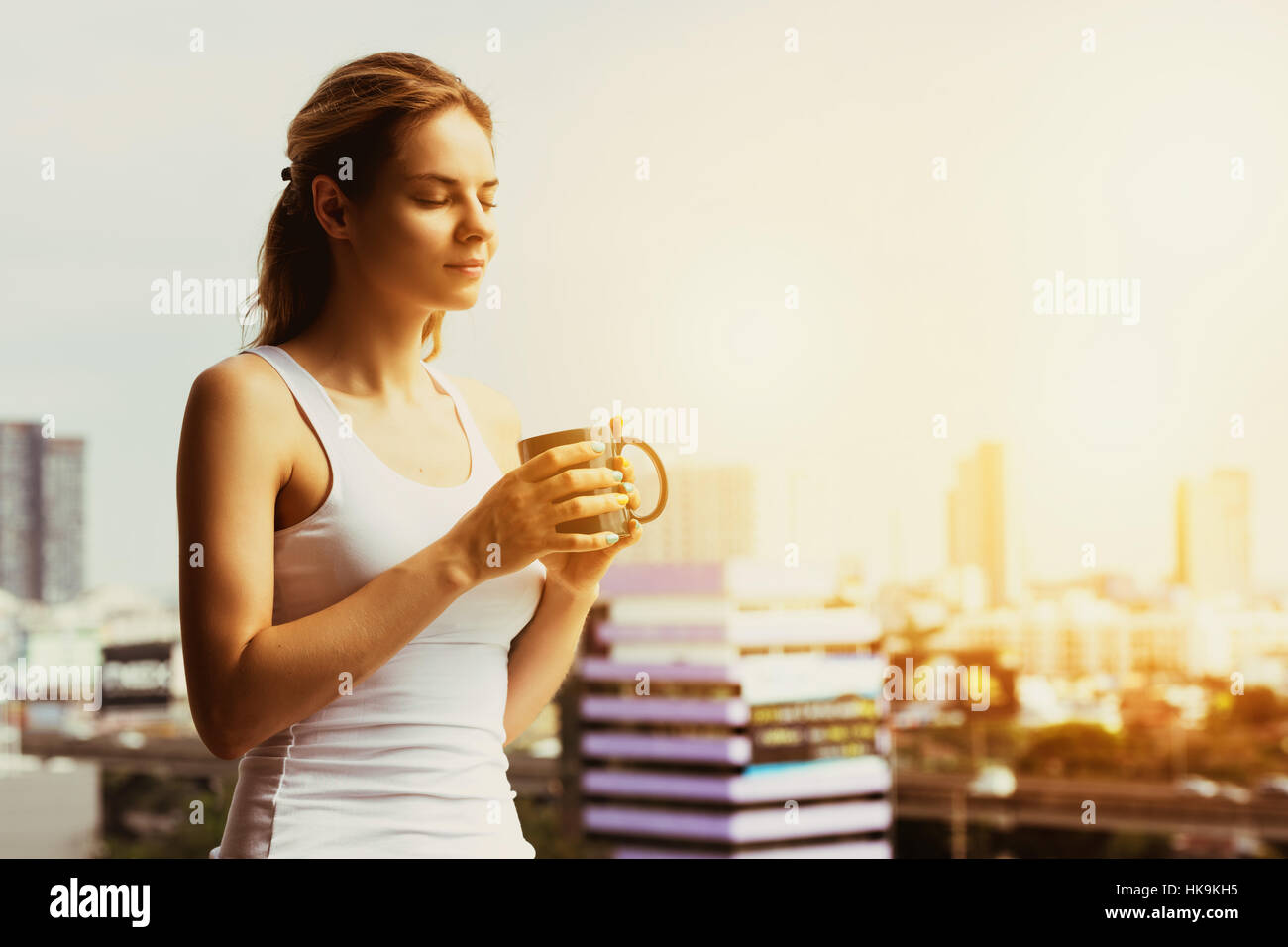 Beautiful girl coffee morning city Stock Photo - Alamy