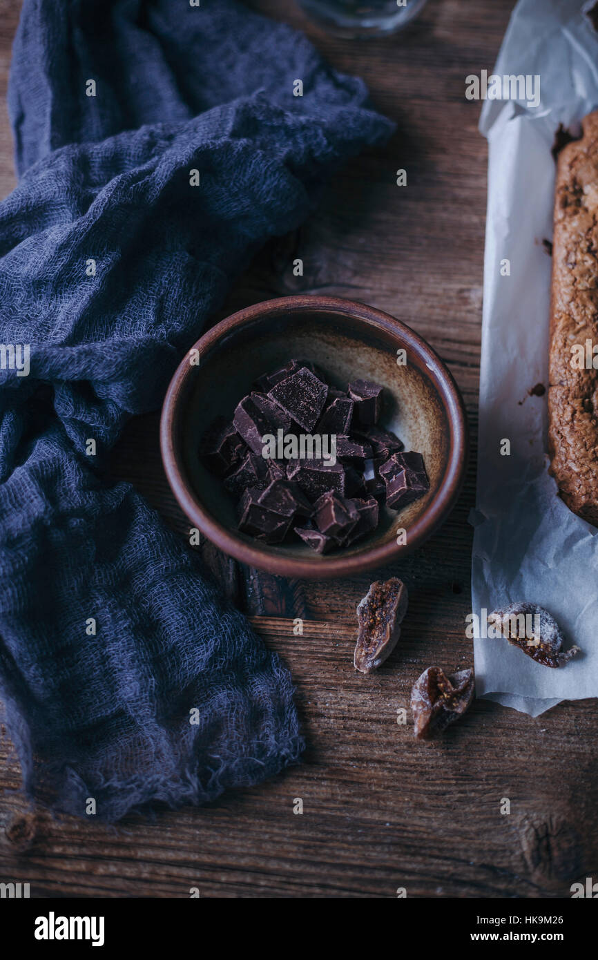 Chopped dark chocolate in a small bowl Stock Photo - Alamy