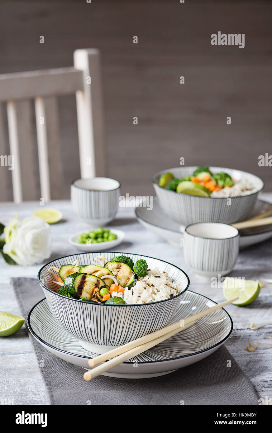 Basmati rice with vegetables on grey background Stock Photo - Alamy