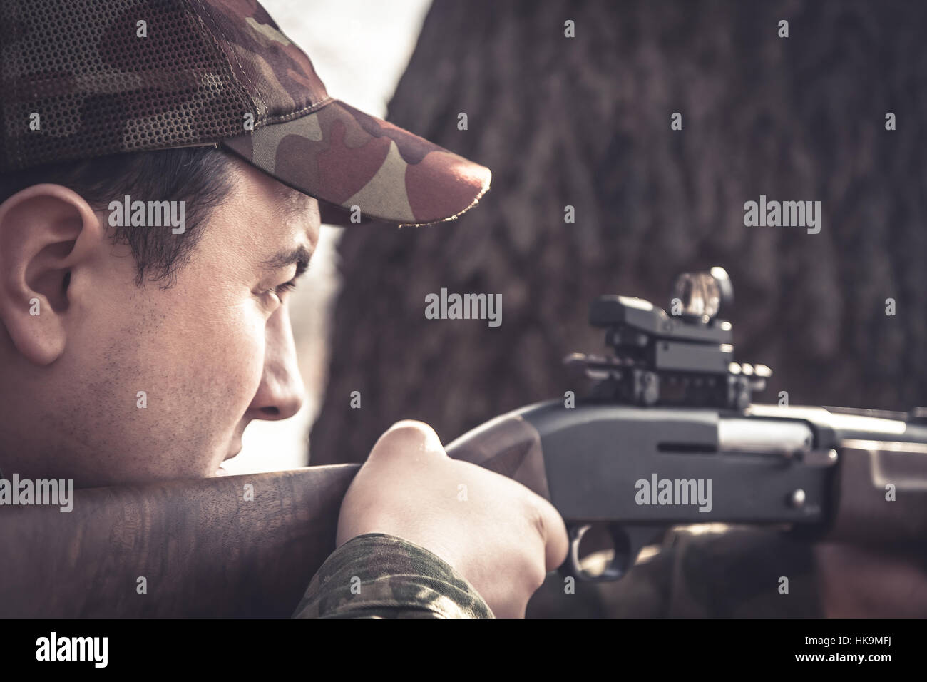 Hunter aiming shotgun hi-res stock photography and images - Alamy