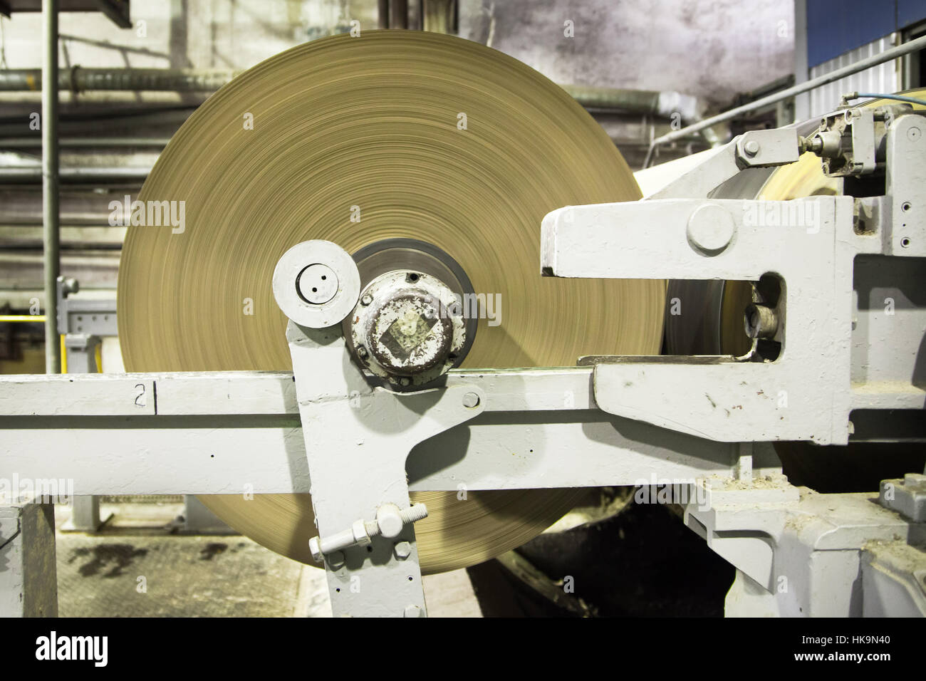 Roll of paper and paper-makin machine. Paper manufacture Stock Photo ...