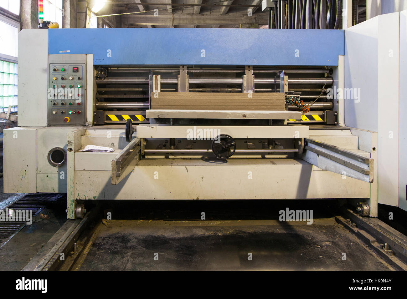 Cardboard manufacture machine with cardboard stack Stock Photo - Alamy