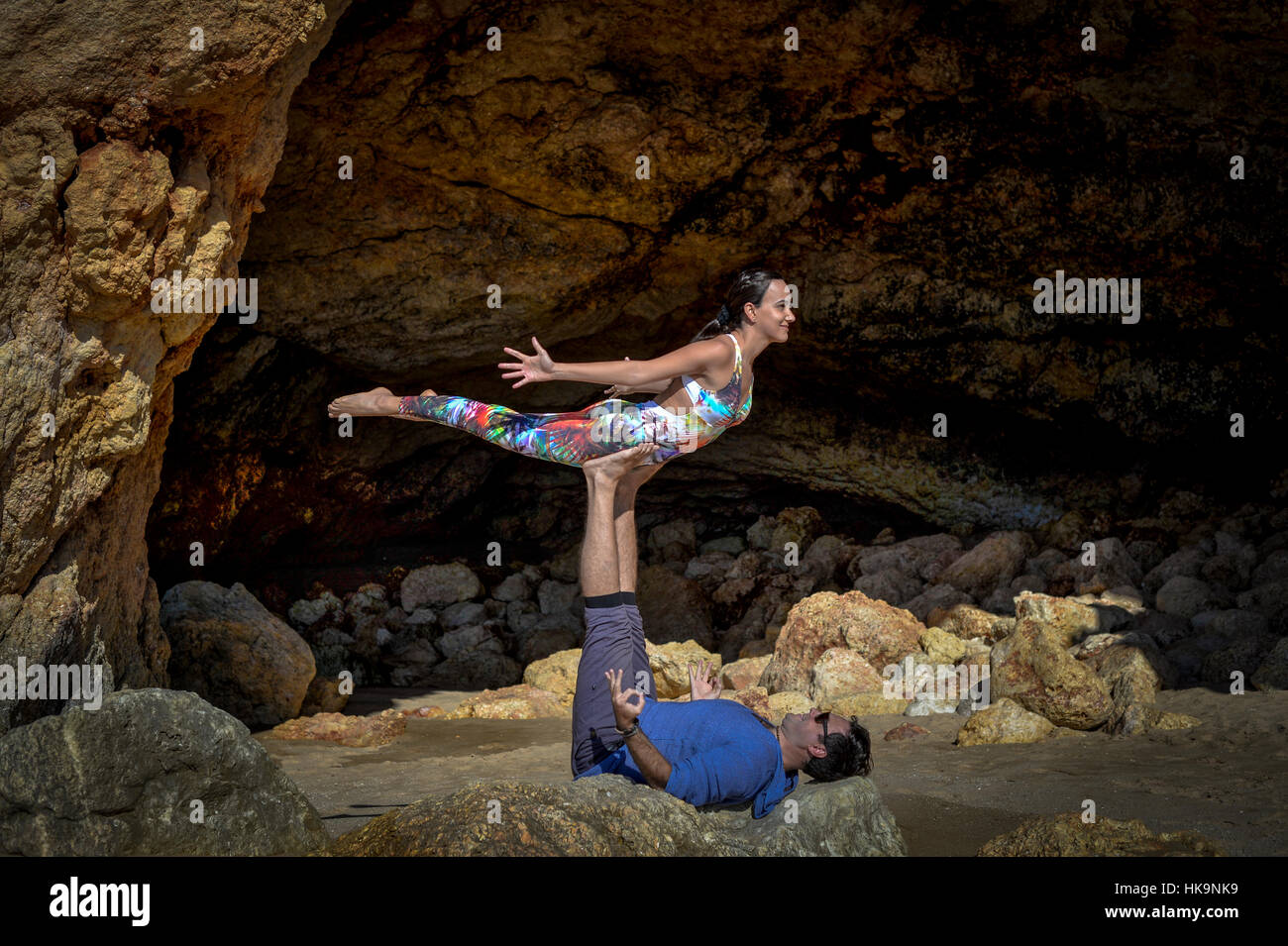 Strong acrobatic woman lifting man hi-res stock photography and images ...
