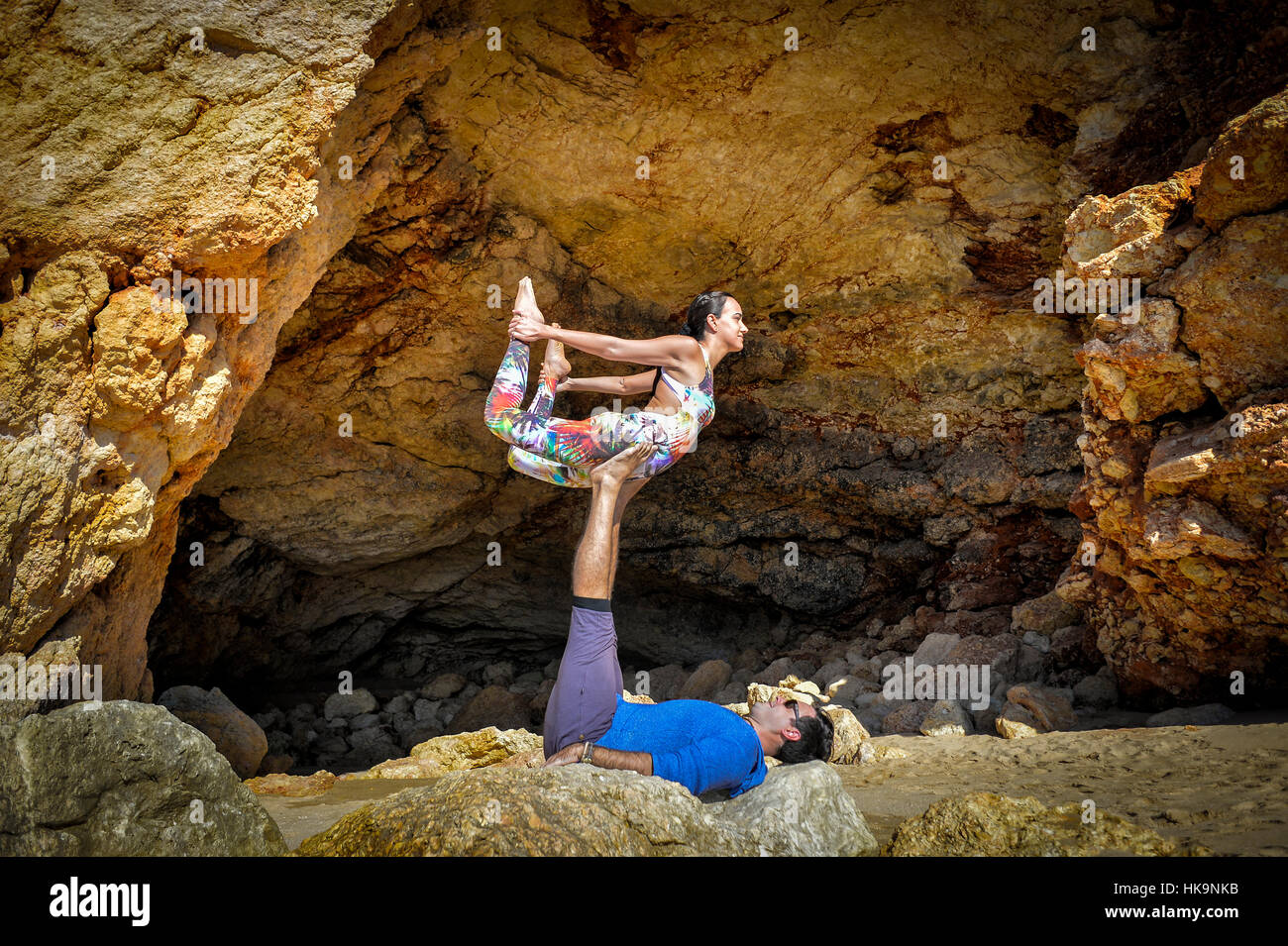 Strong acrobatic woman lifting man hi-res stock photography and images ...