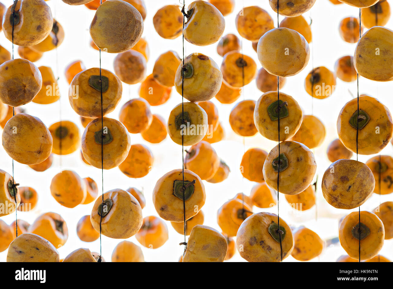Japanese persimmons drying hi-res stock photography and images - Alamy