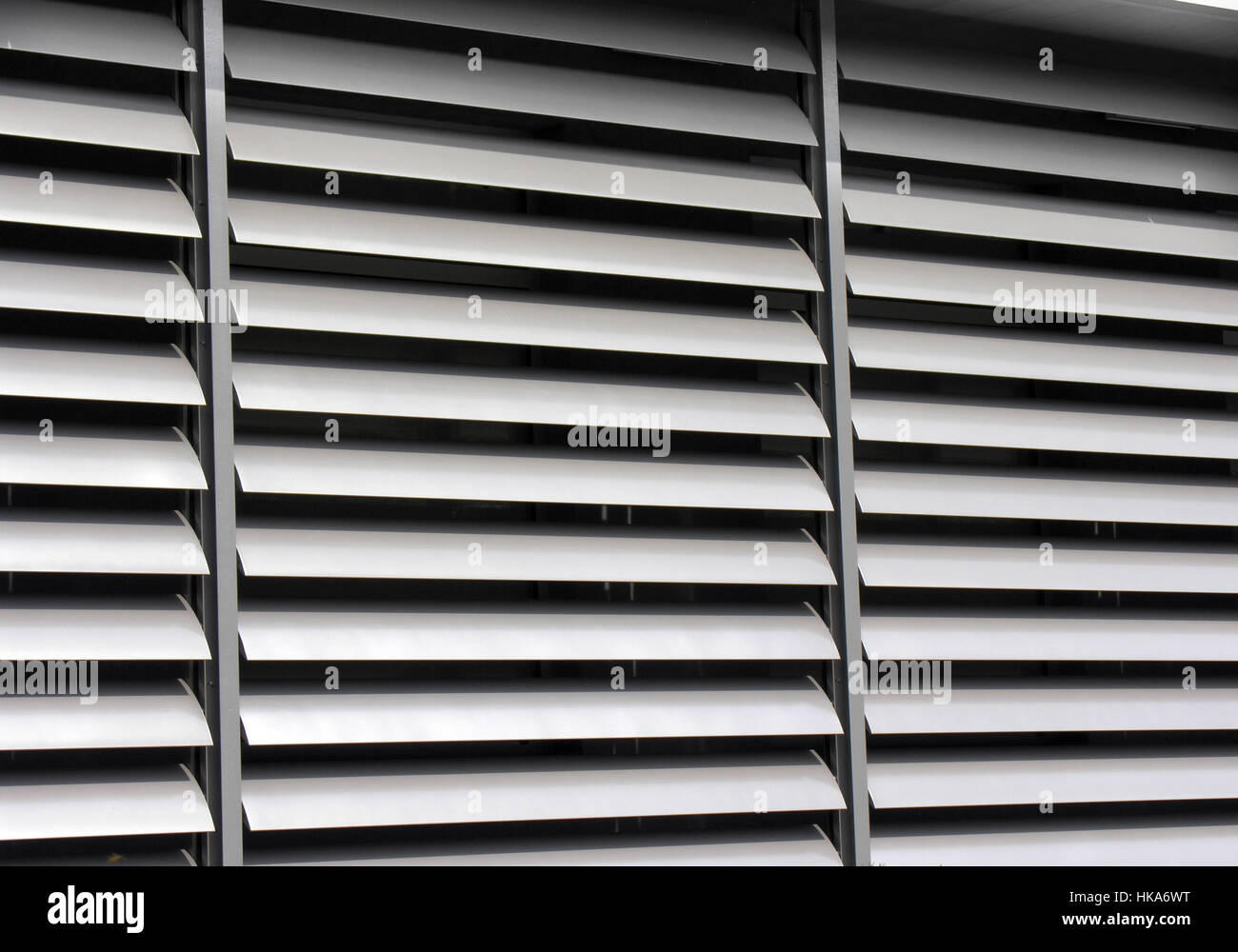 opened metallic window shutter at the office building Stock Photo - Alamy