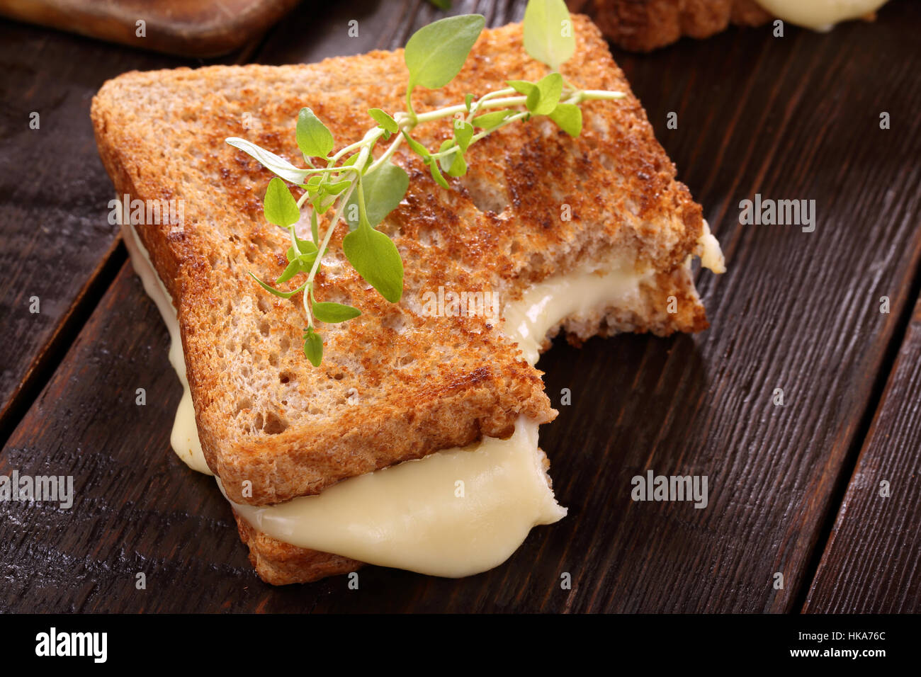 Fresh toast with cheese and herbs Stock Photo - Alamy