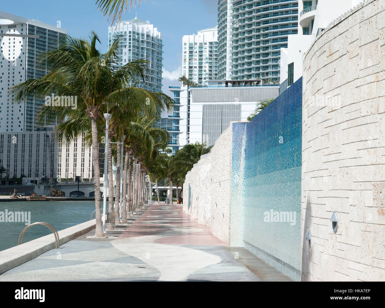 The view of Miami Riverwalk with downtown skyscrapers in a background ...