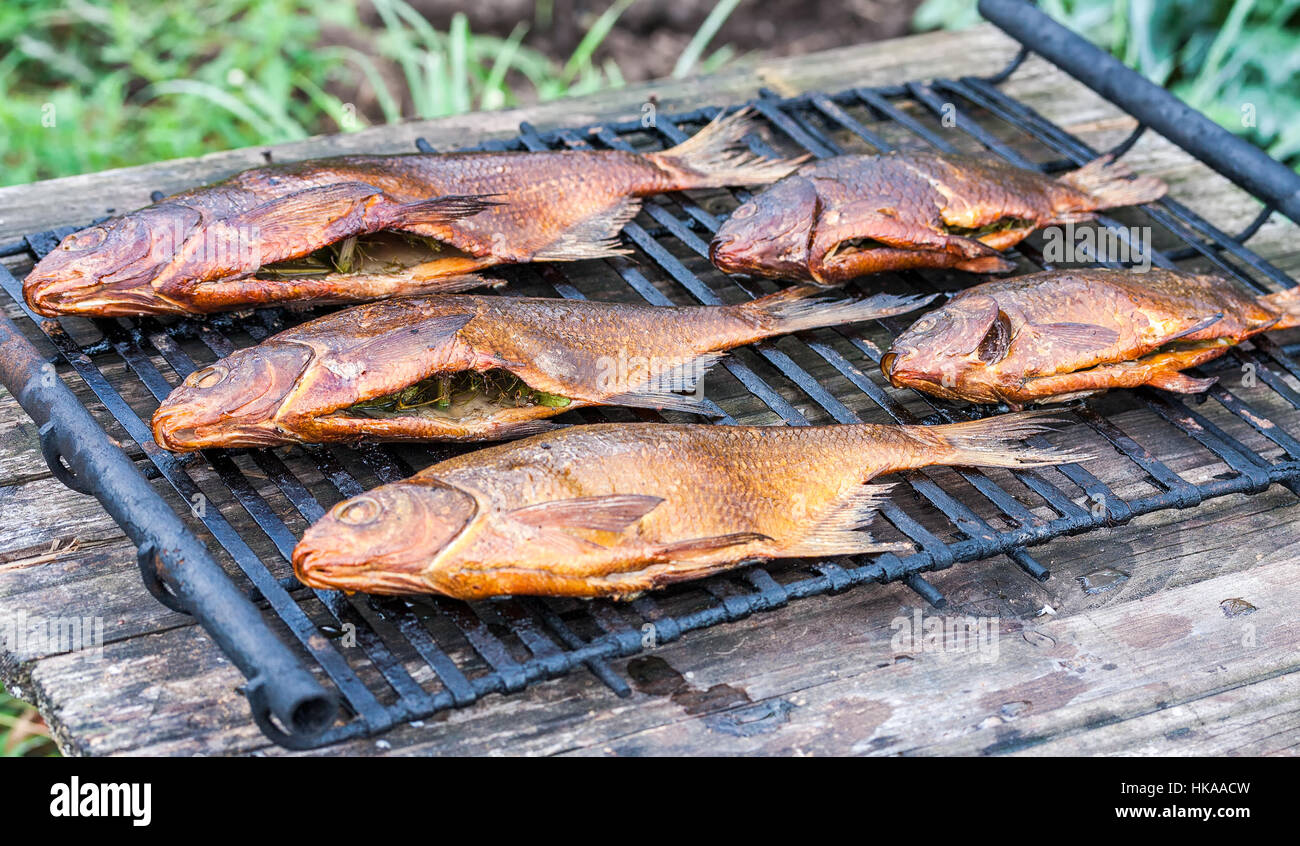 Just smoked fresh fish caught in Russian river Stock Photo - Alamy