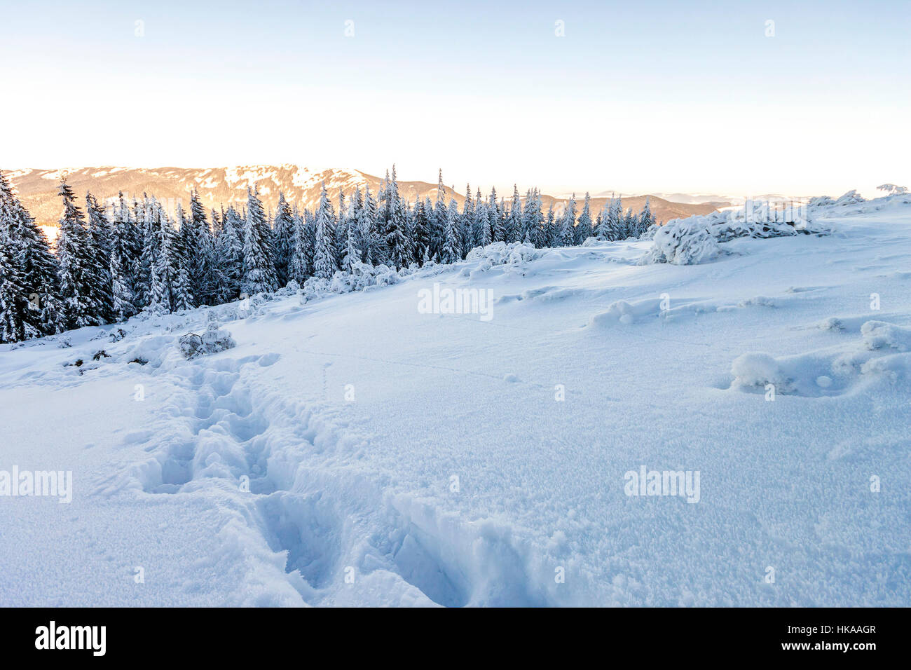 Snow covered hills in mountains Stock Photo - Alamy
