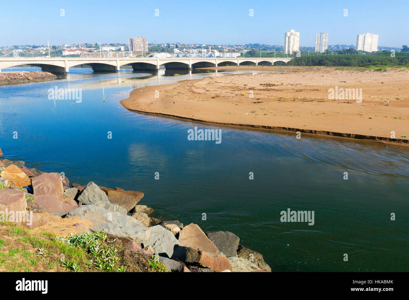 Blue Lagoon against Mgeni river bridge, city skyline and blue sky in ...