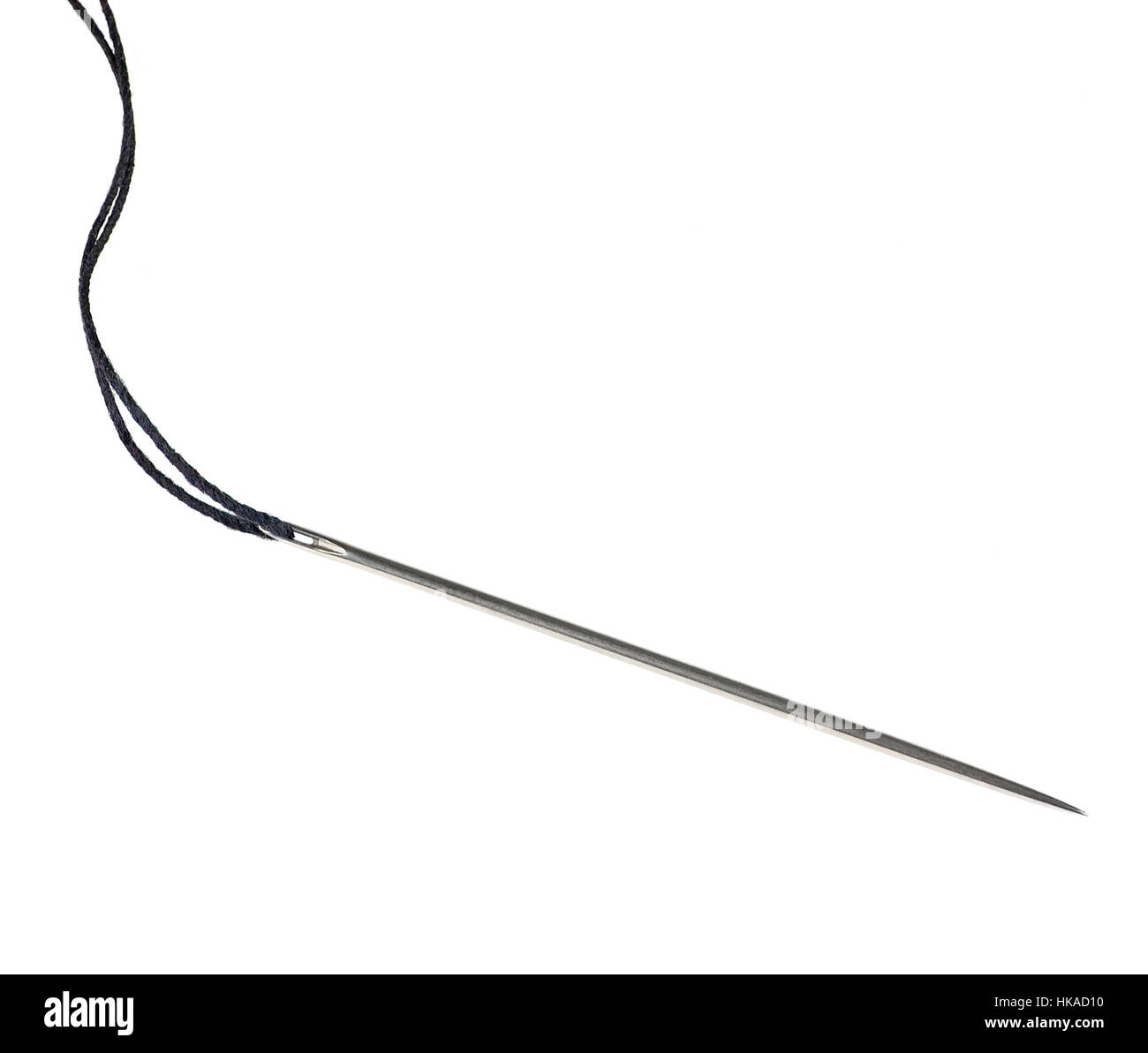 Needle for sewing and black thread, macro closeup, isolated Stock Photo ...