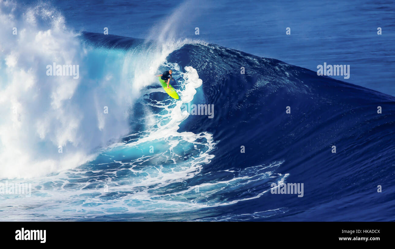 Surfing the blue ocean Stock Photo - Alamy