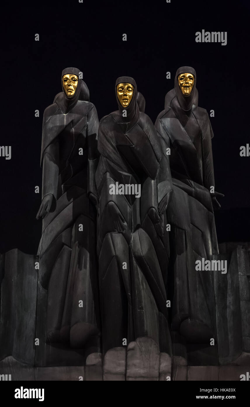 Statues of Three Muses on Lithuanian National Drama Theatre at night ...