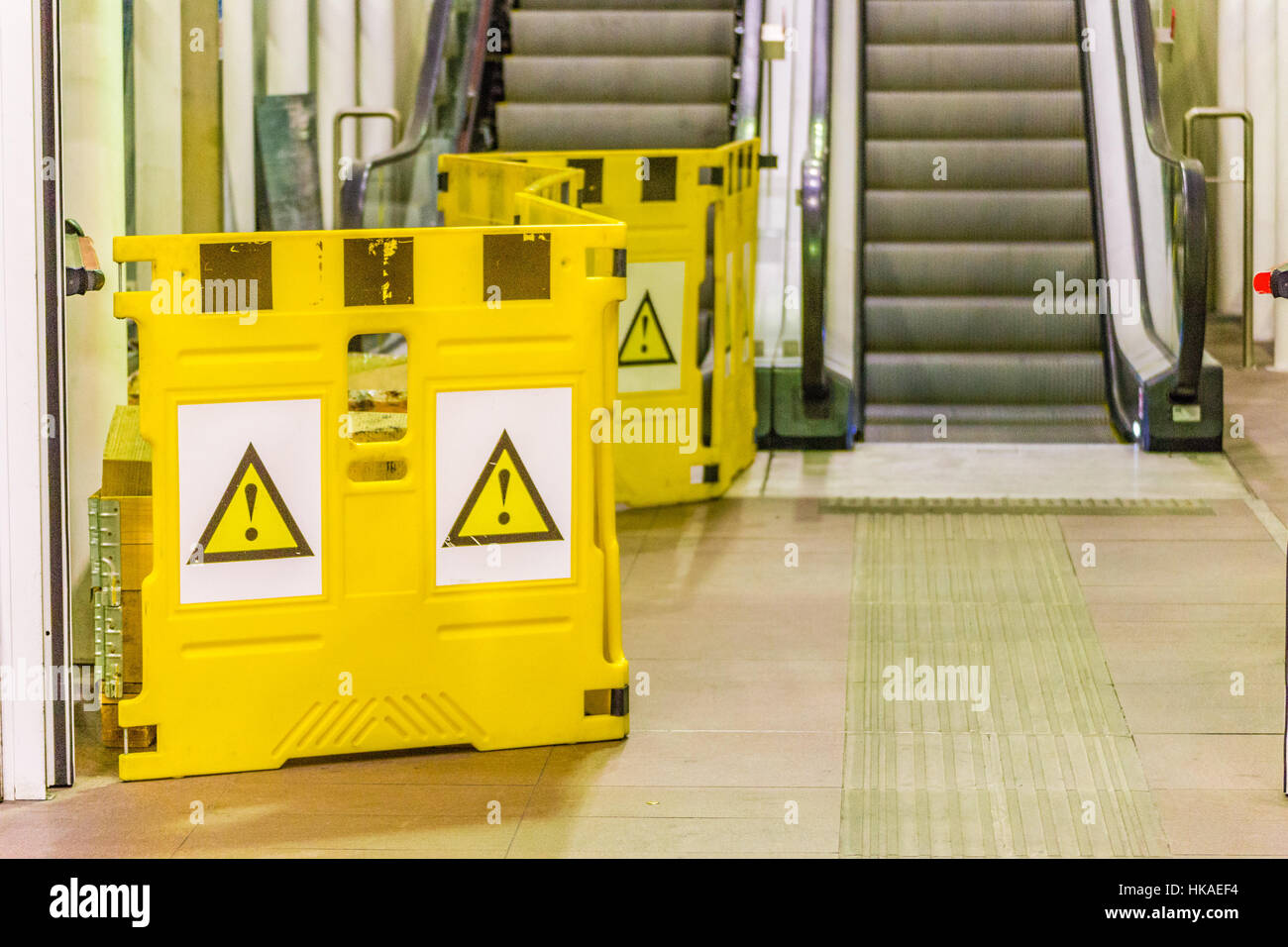 under construction signboards blocking access to damaged flight of ...
