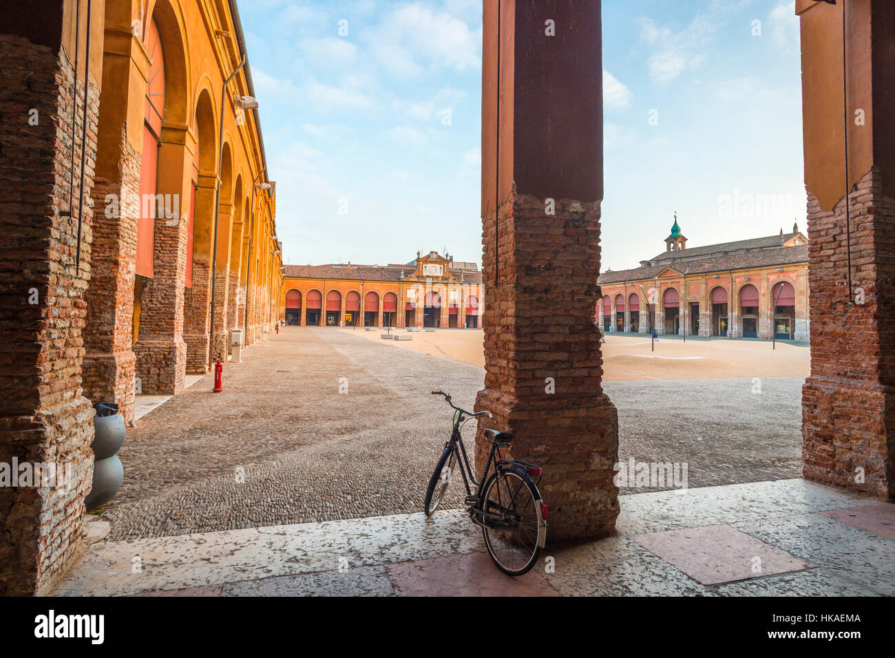 bicycle and ancient arcade in Italy at sunset Stock Photo - Alamy