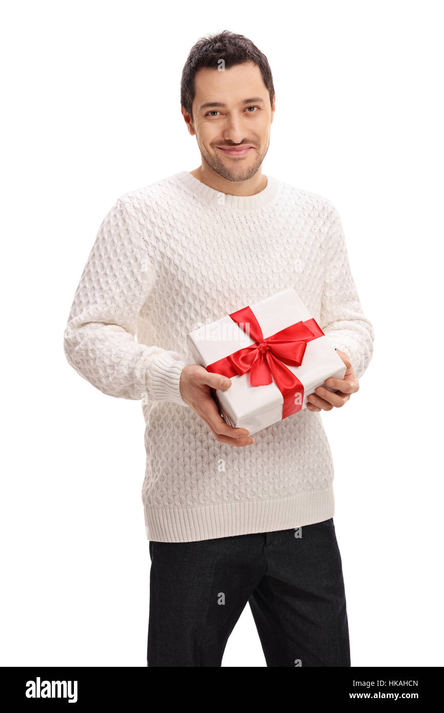 Man holding a present isolated on white background Stock Photo - Alamy