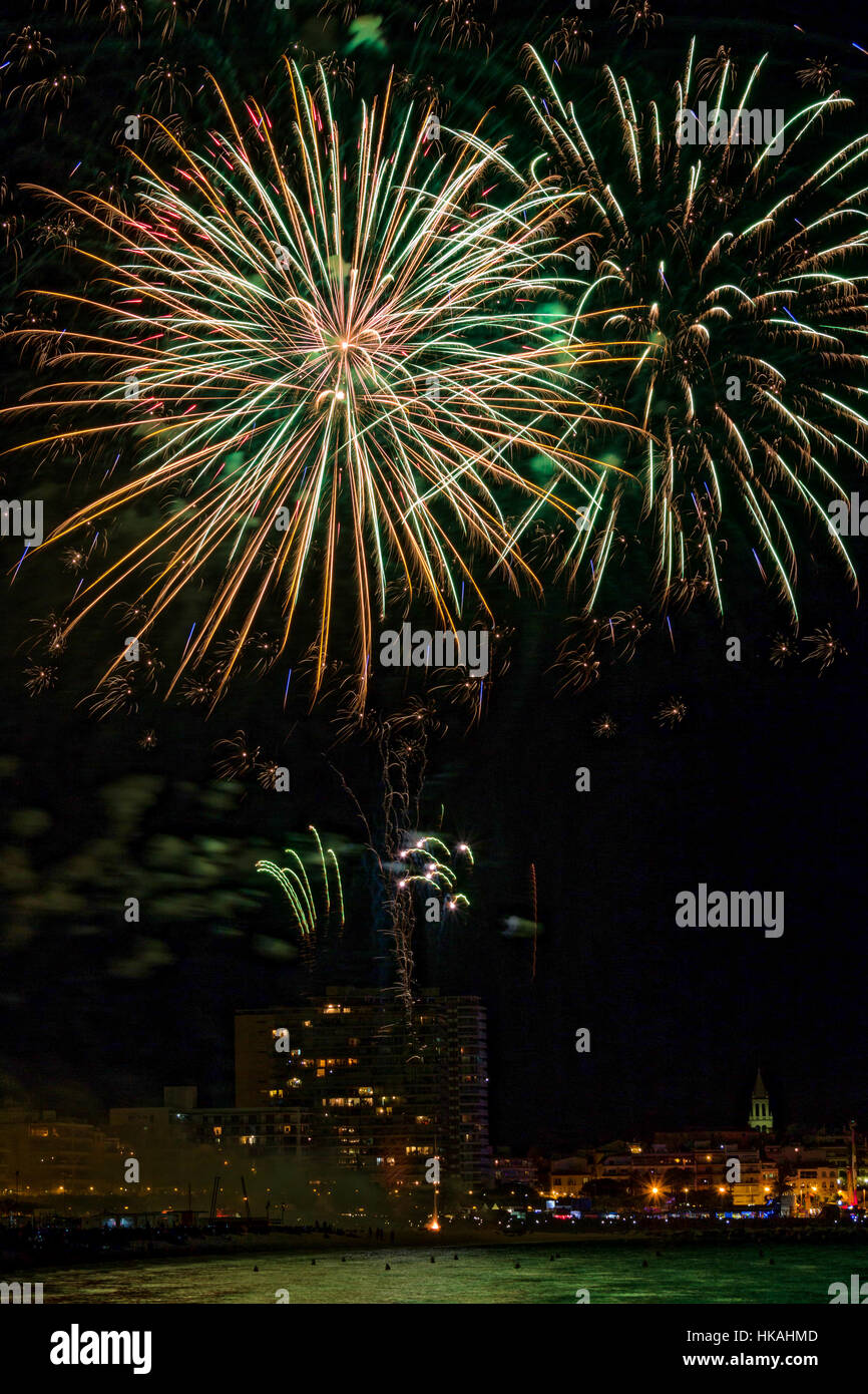 Interesting fireworks over the small town in Spain, Palamos Stock Photo ...