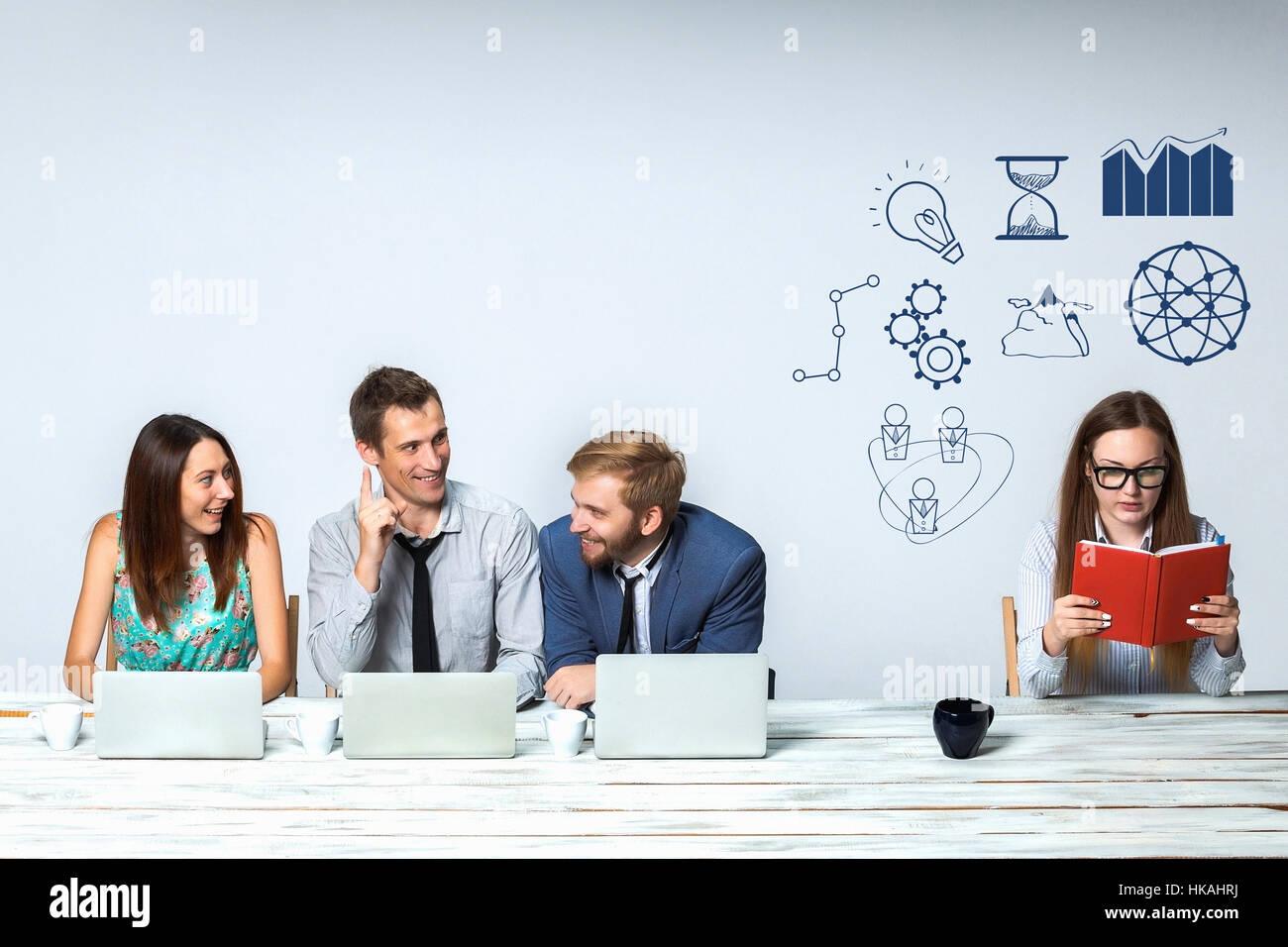 Business team working on their project together at office Stock Photo ...