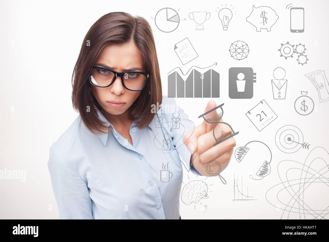 Business woman thinking many ideas Stock Photo - Alamy