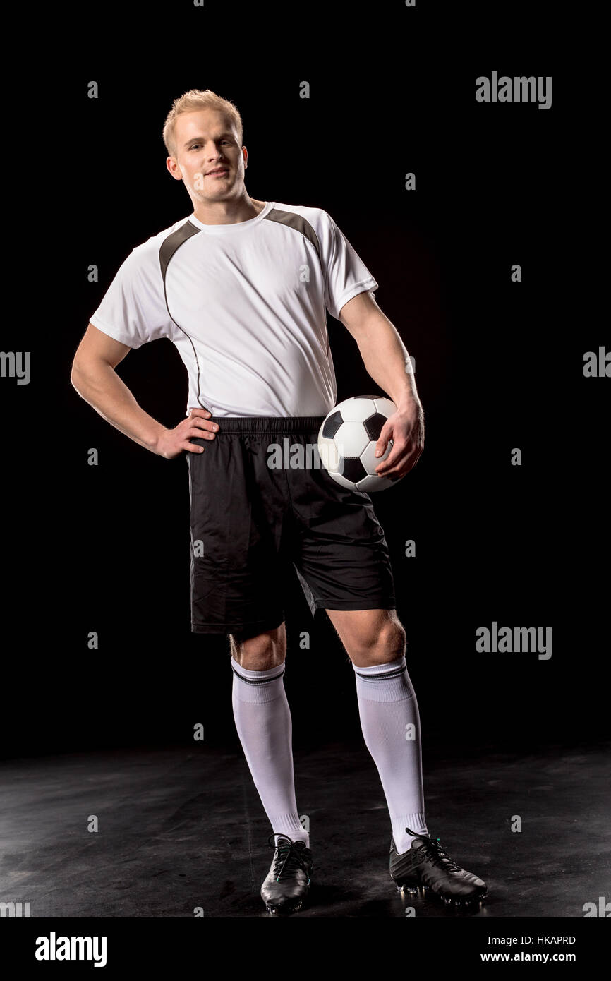 Soccer player with ball Stock Photo - Alamy