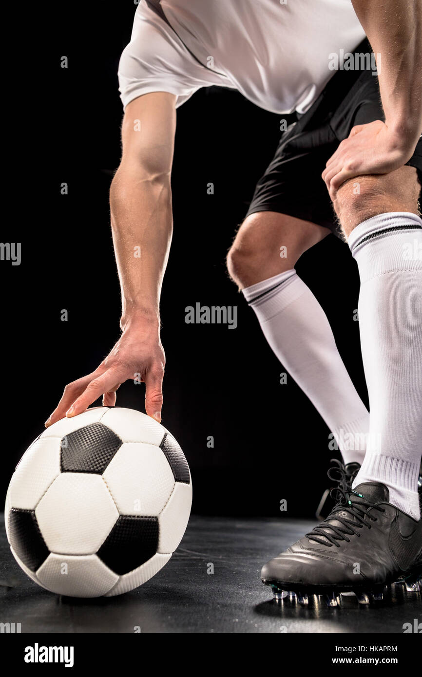 Soccer player with ball Stock Photo - Alamy
