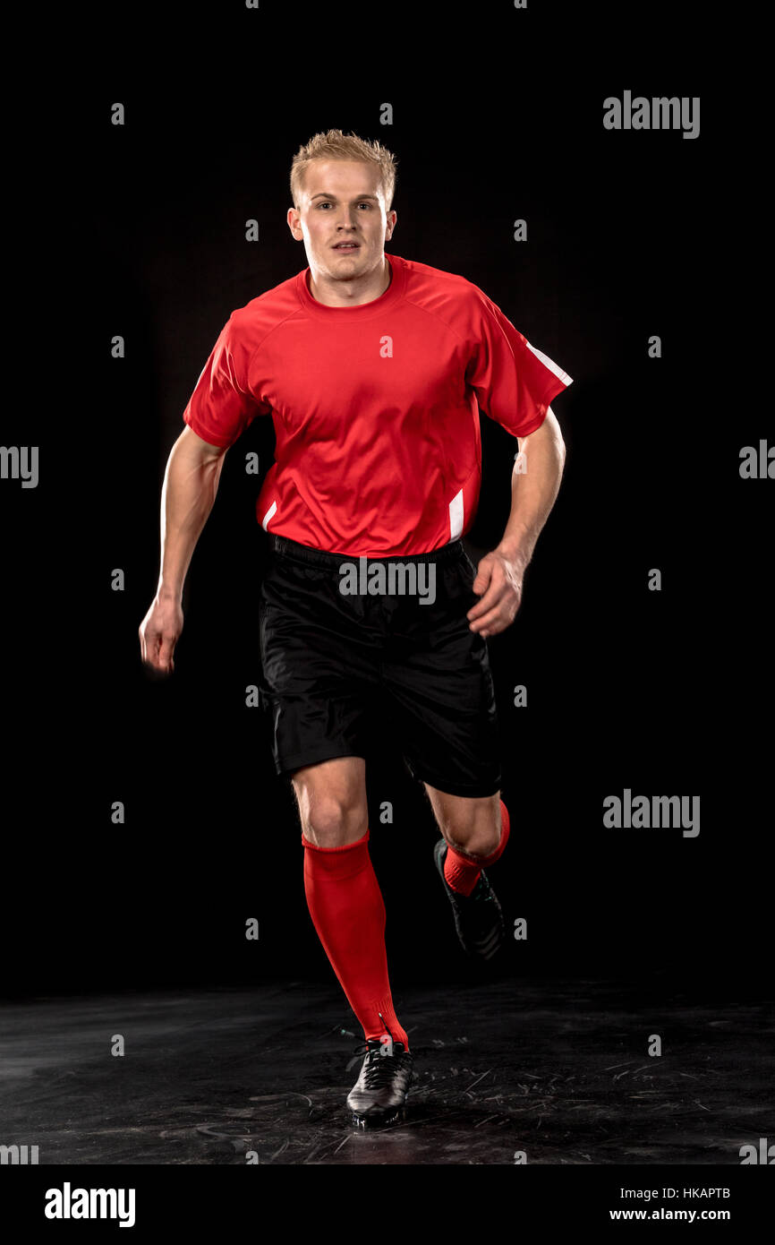 Soccer player in uniform Stock Photo - Alamy