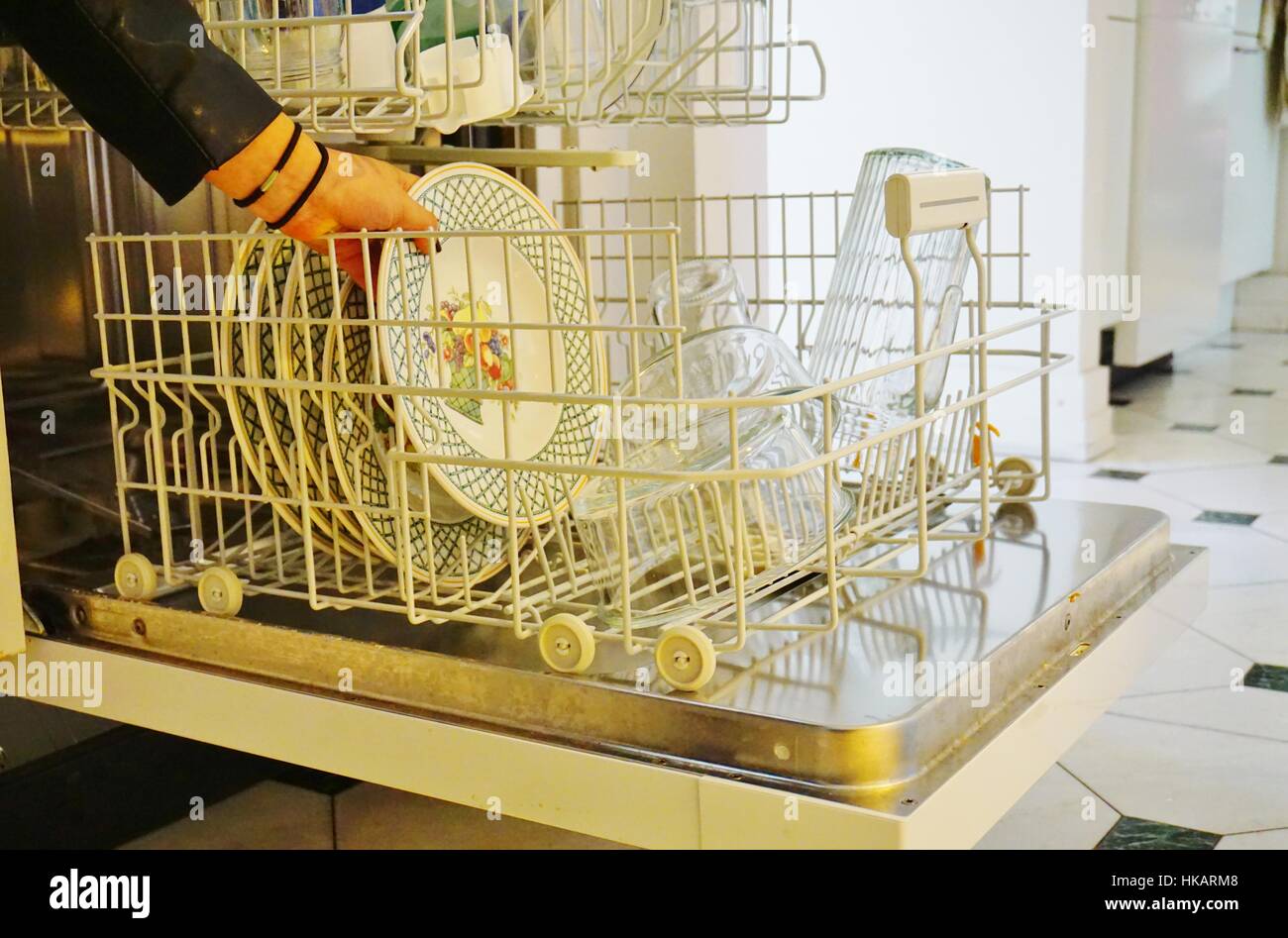 Unloading dishwasher hi-res stock photography and images - Alamy