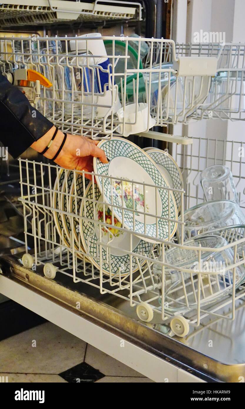 Unloading dishwasher hi-res stock photography and images - Alamy