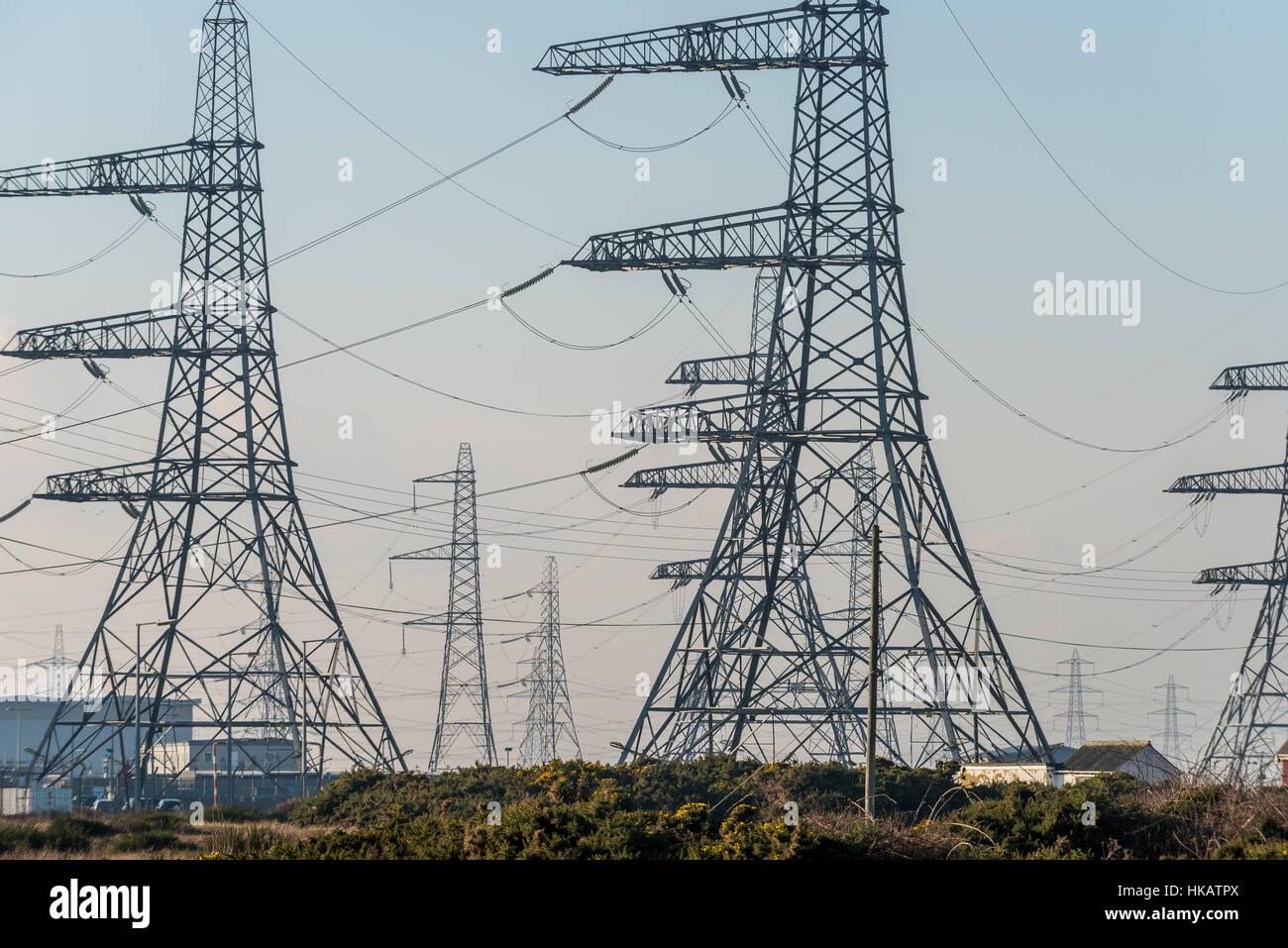 Electrical pylons at the Dungeness Power Station in Kent Stock Photo ...
