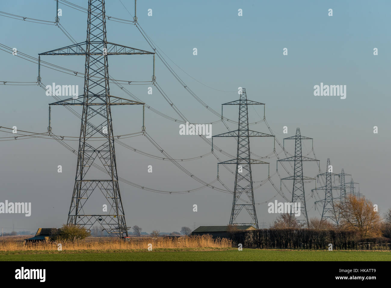 Electricity pylons at Romney Marsh on the Kent and Sussex border Stock ...